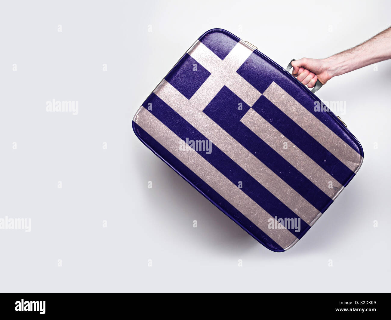 Hand holding greek flag on hi-res stock photography and images - Alamy