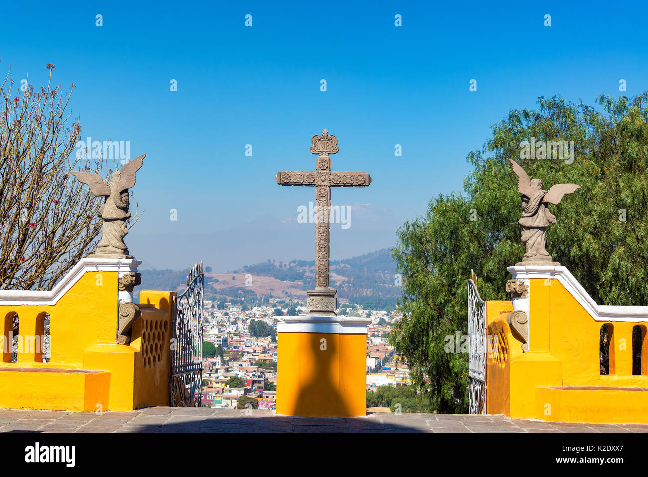 Cross with a city view in Cholula, Mexico Stock Photo - Alamy