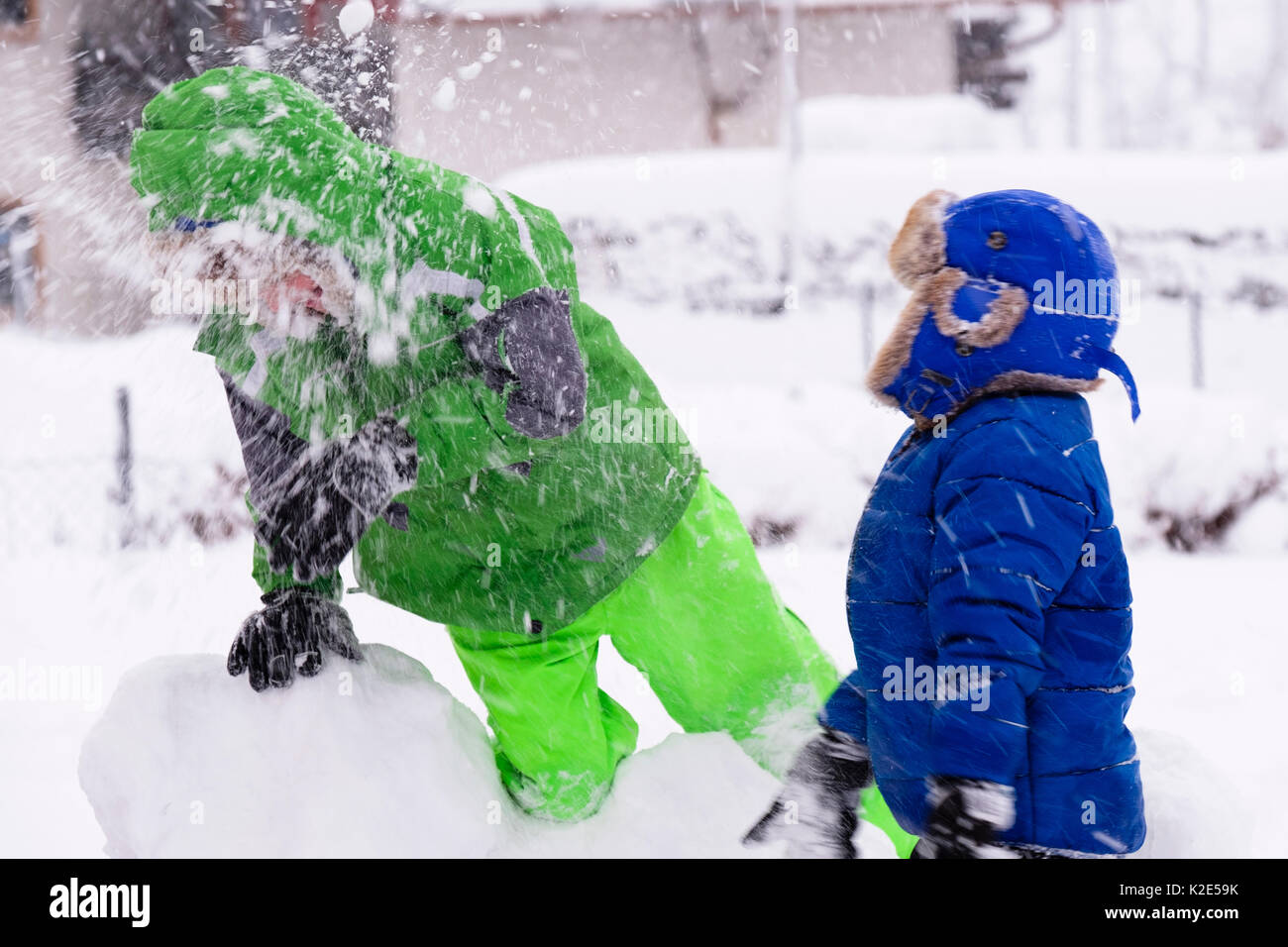 Snowball fight children hi-res stock photography and images - Alamy
