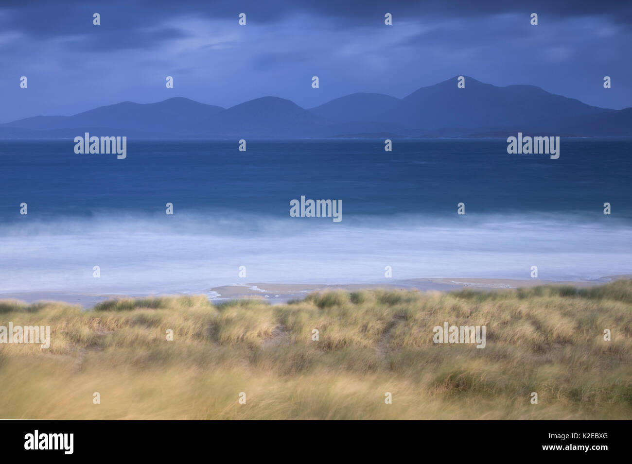 View across Sound of Taransay to North Harris hills in stormy weather ...