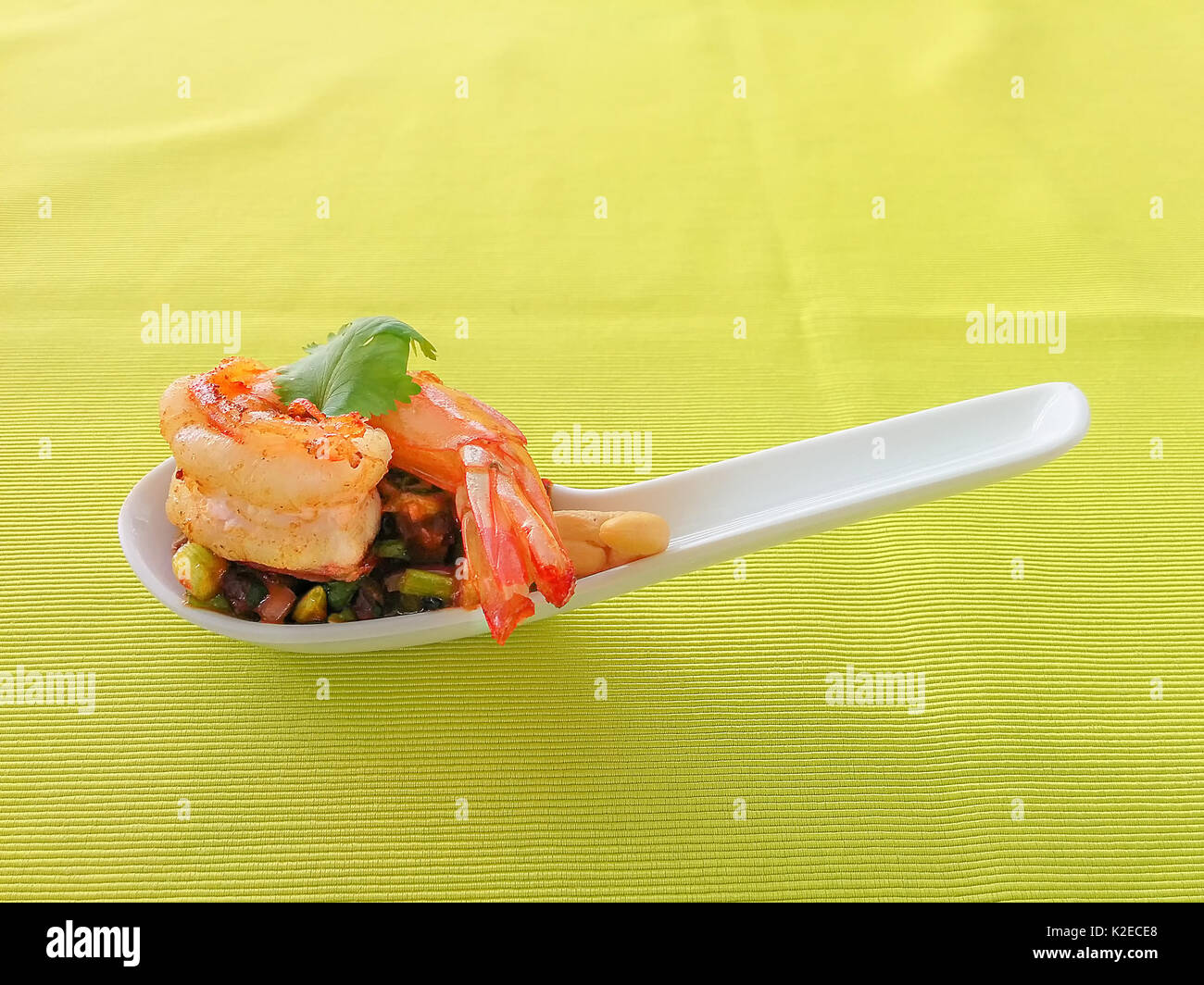 Shrimp cocktail. Stir-fried shrimp. Shrimp served on a spoon. A ...