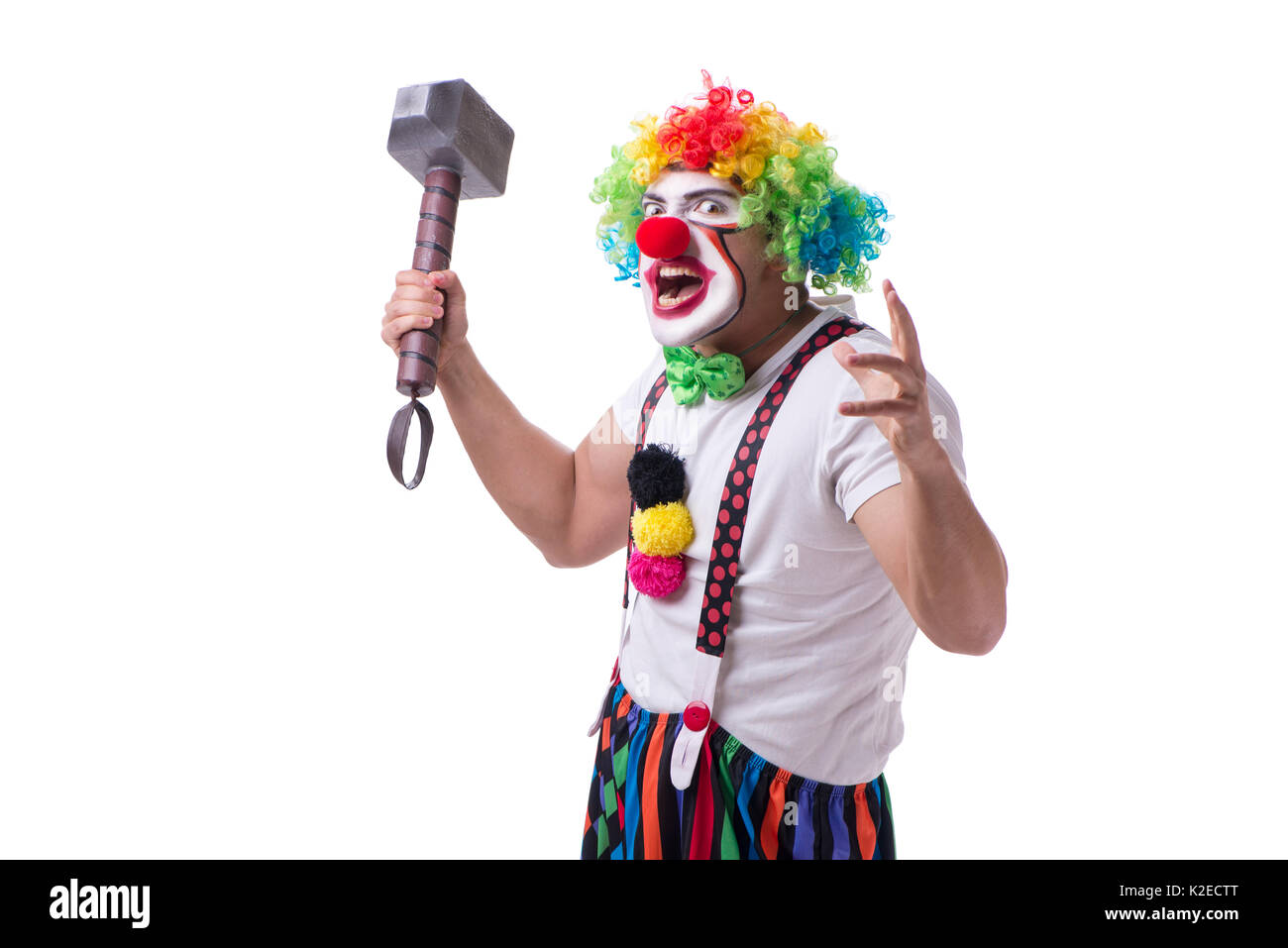 Funny clown with a hammer isolated on white background Stock Photo - Alamy