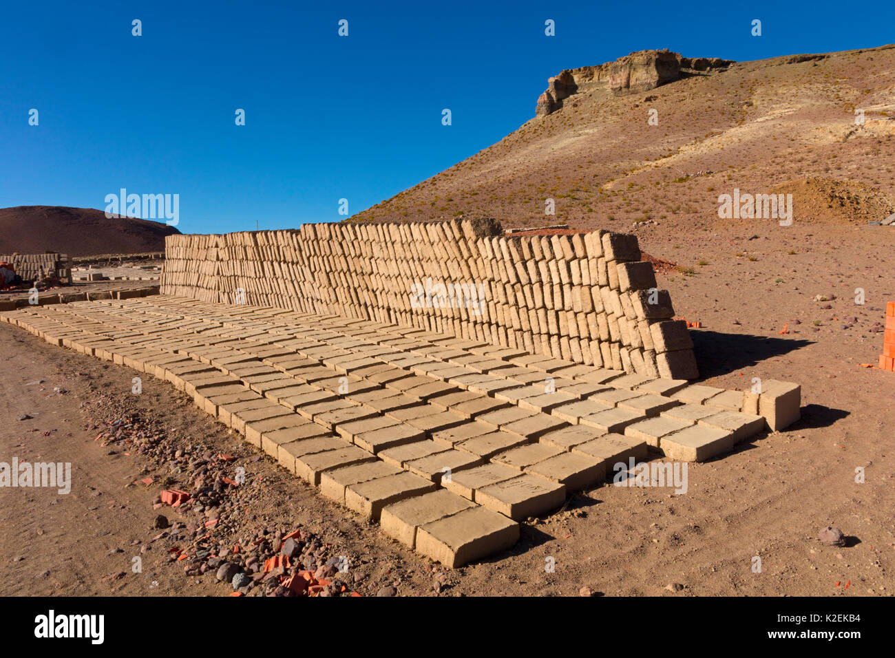 Adobe mud bricks drying and stacked ready for use. Bolivia. December ...