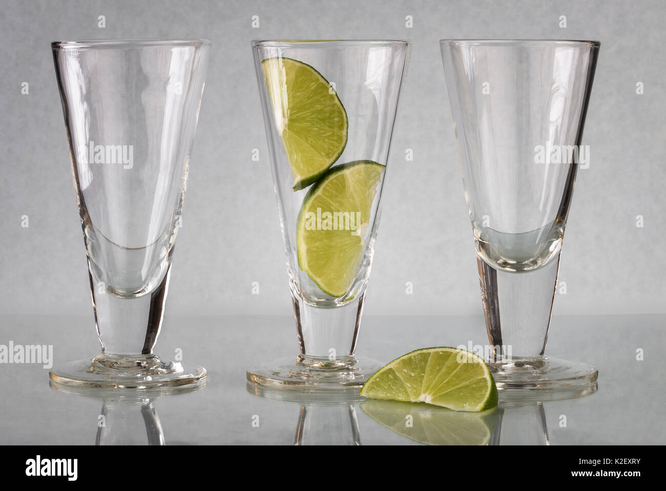 Limes in glassware Stock Photo - Alamy