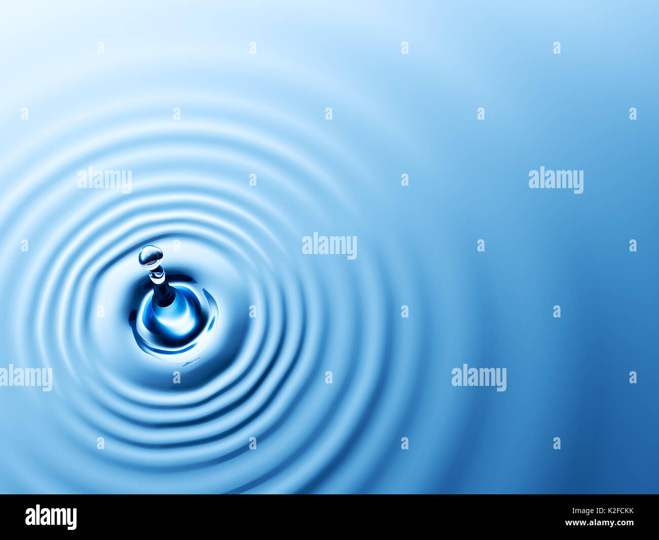 Top view of a water drop with ripples Stock Photo - Alamy