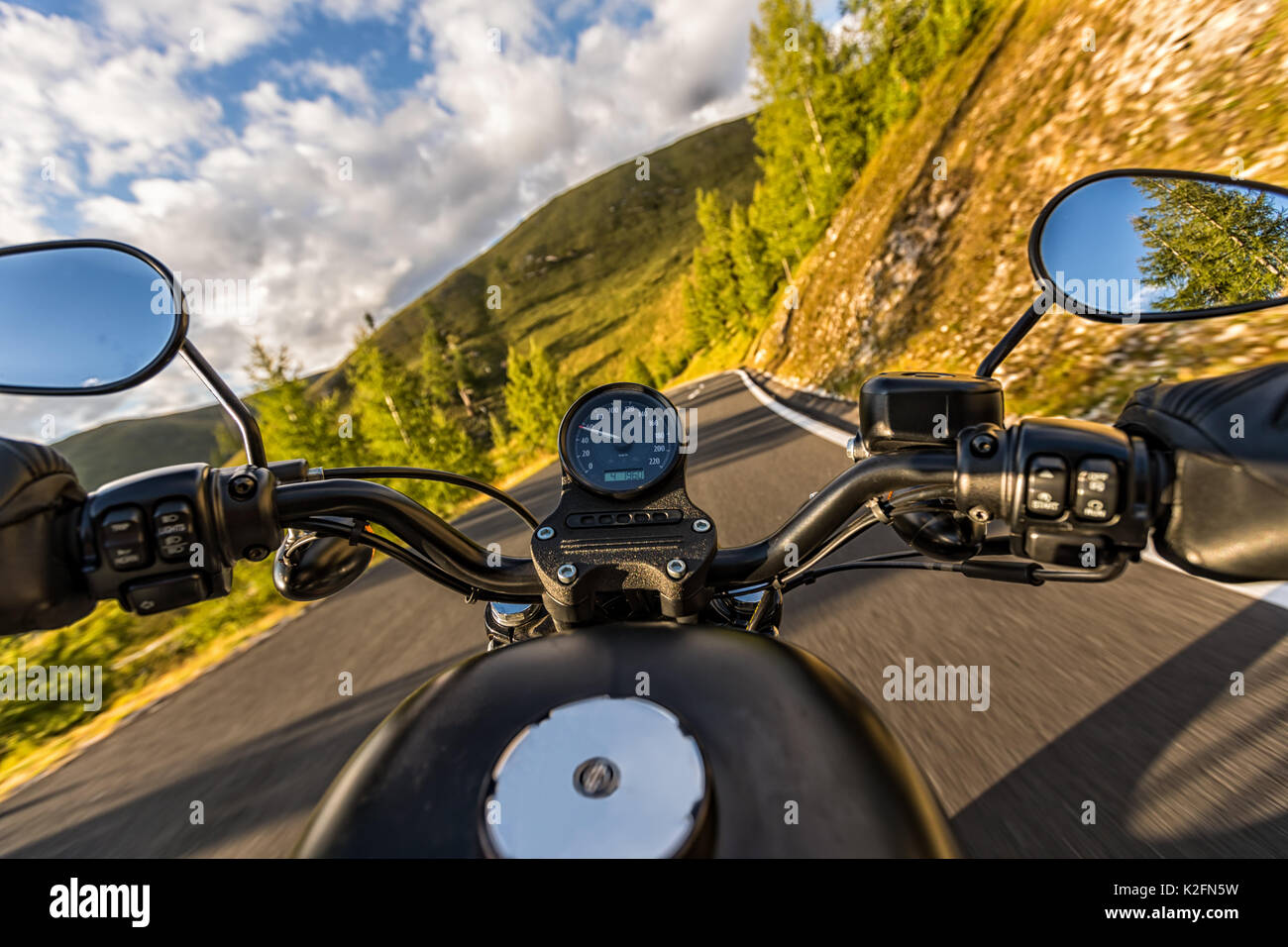 Detail of motorcycle handlebars. View from driver perspective ...