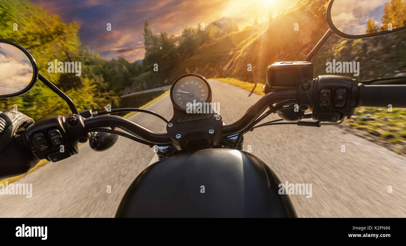 Detail of motorcycle handlebars. View from driver perspective ...