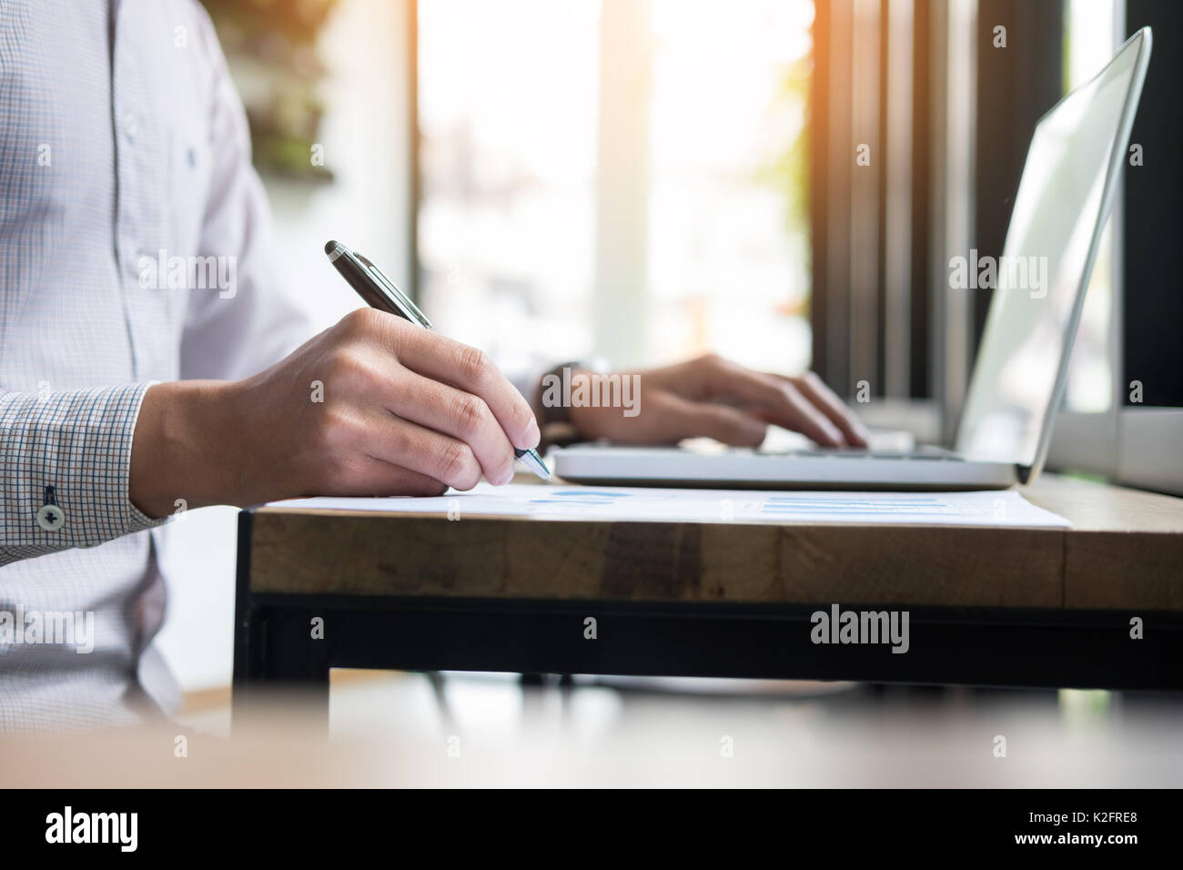 Creative hand taking notes on the notepad. reative writing idea at ...