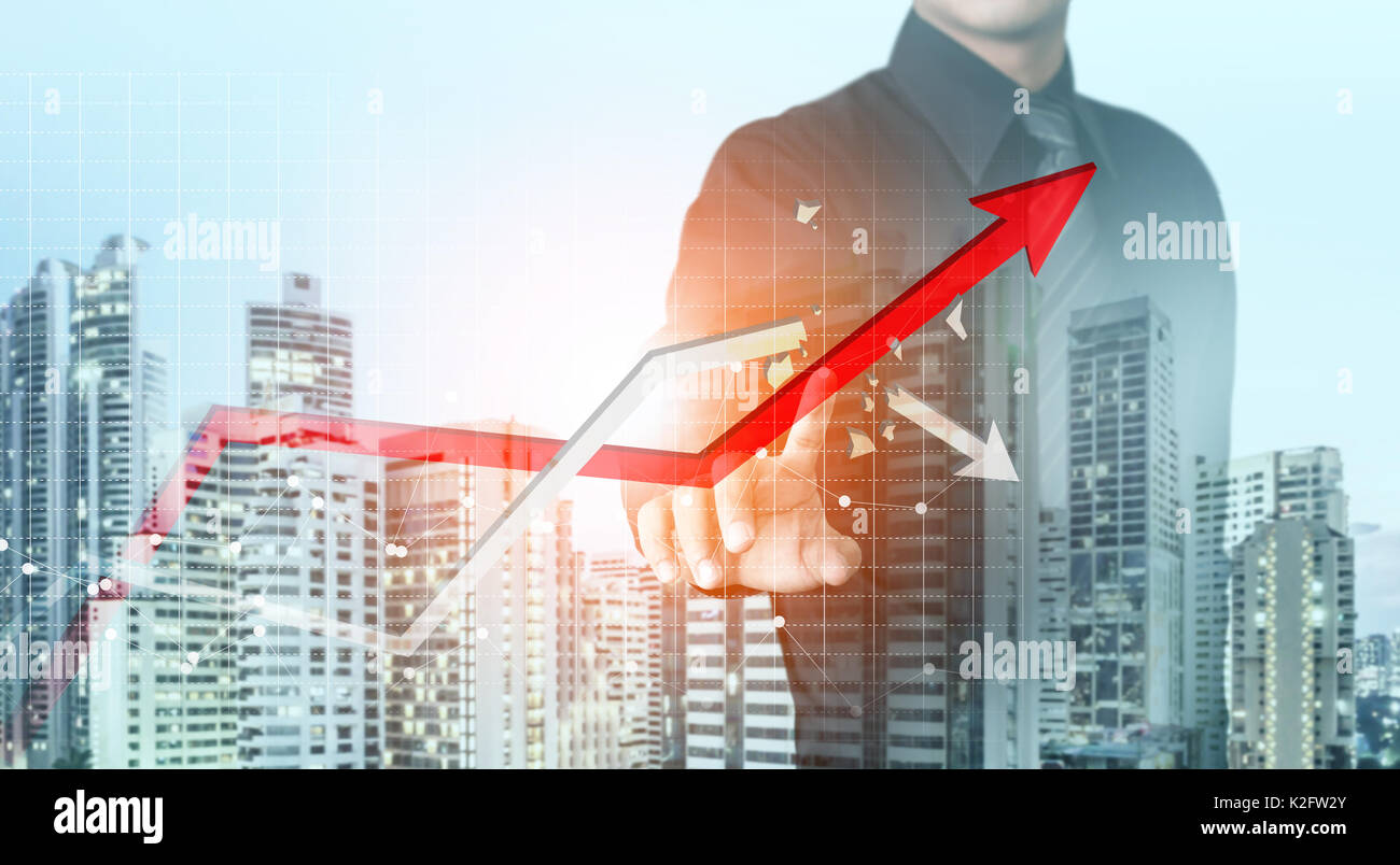 Businessman point at increasing graph and decreasing broken graph with ...