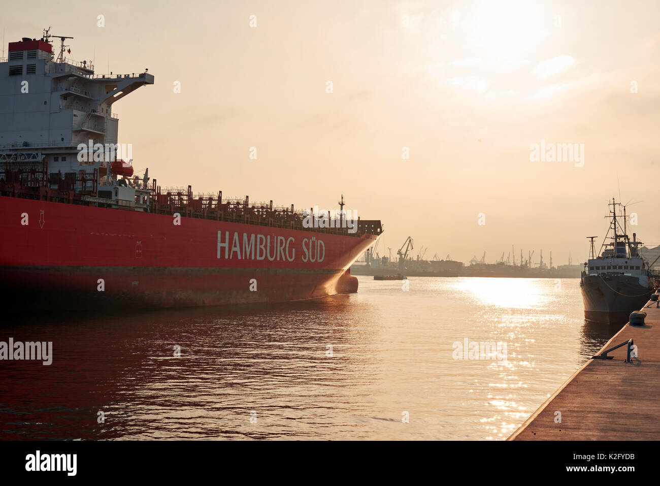 Hamburg Harbor Sunset, Cargo ship Stock Photo - Alamy
