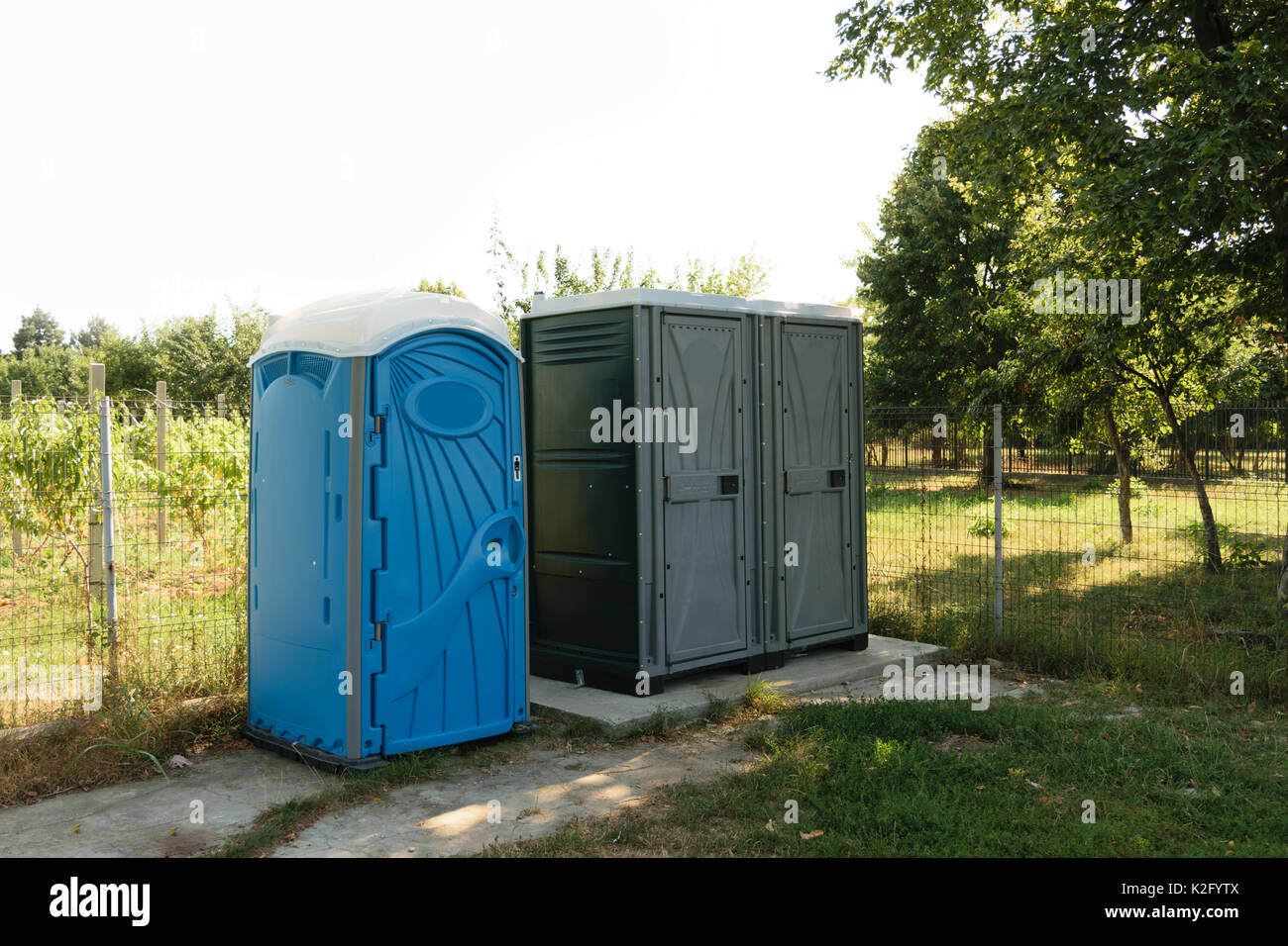 public toilets installed in green park Stock Photo - Alamy