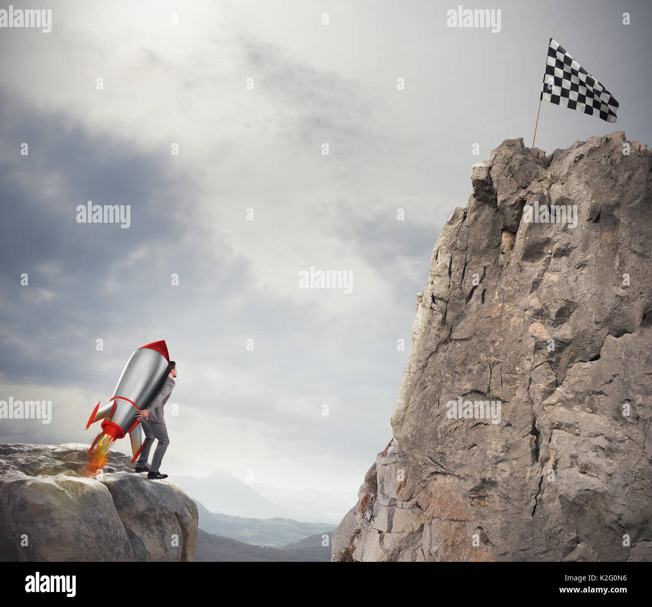 Determination and power businessman that holds a rocket to reach the ...