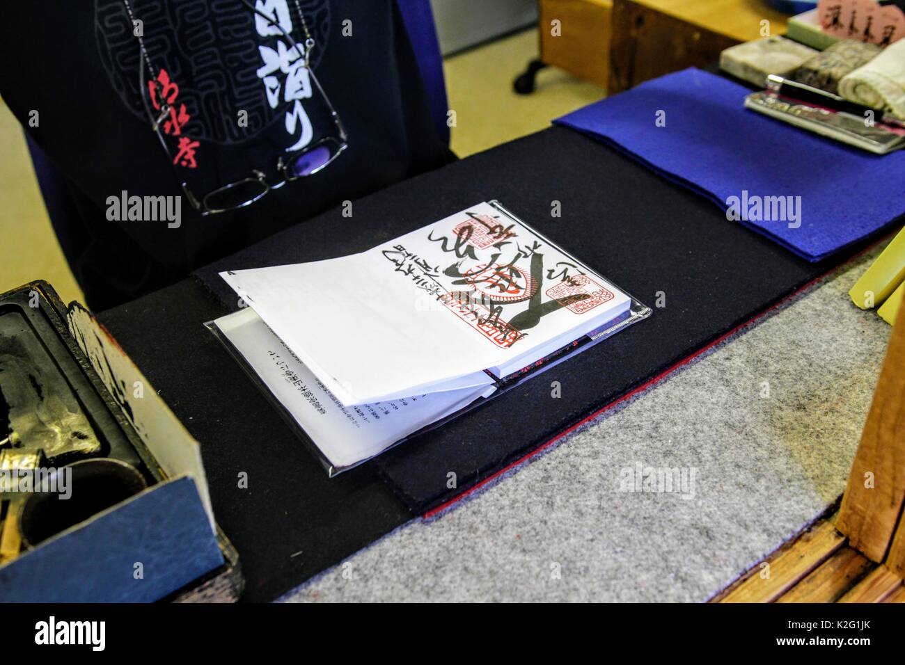 Traditional Japanese writing performed at Temples and Shrines Stock ...