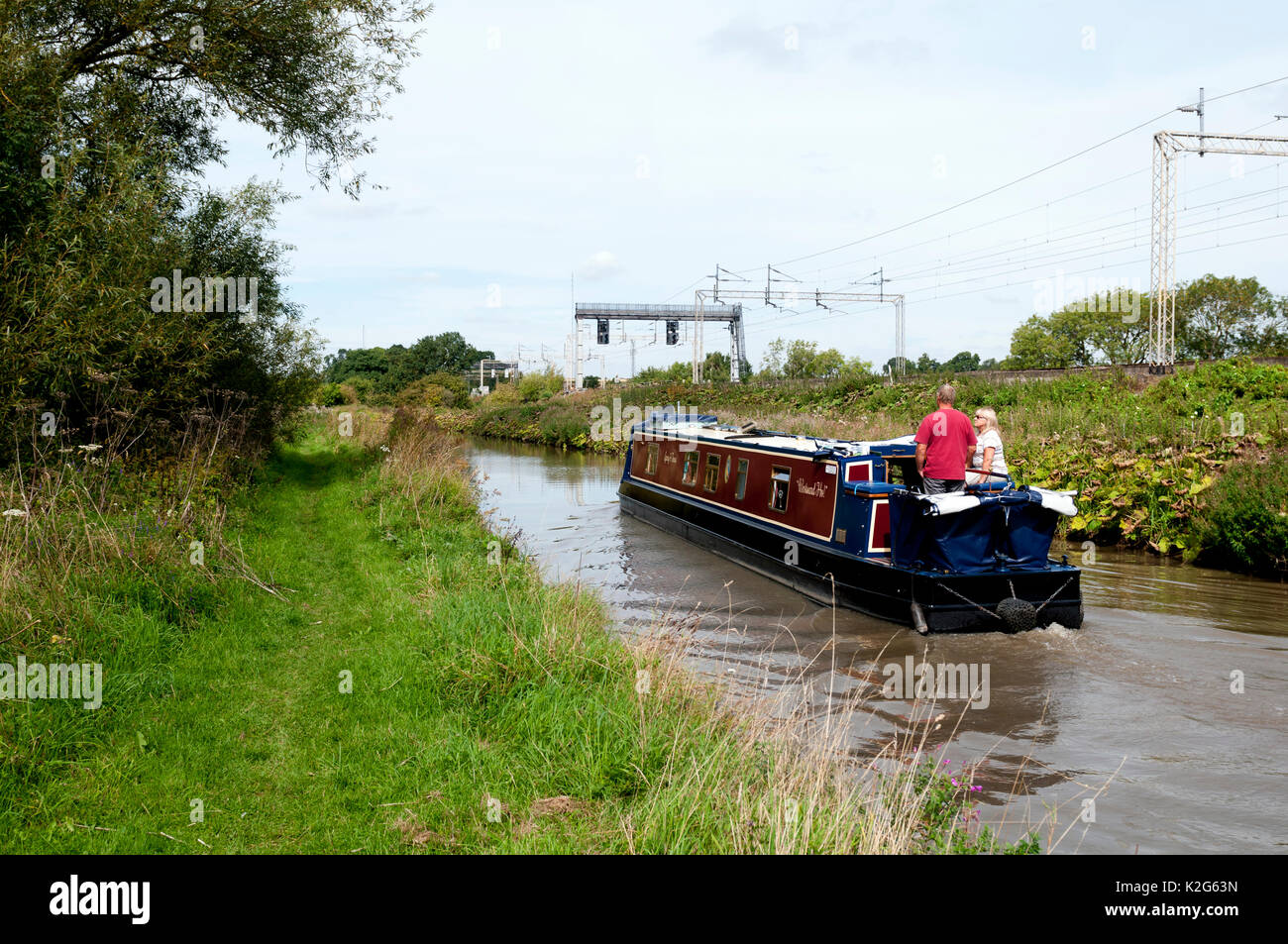 Narrowboat on the Oxford Canal alongside the West Coast Main Line ...