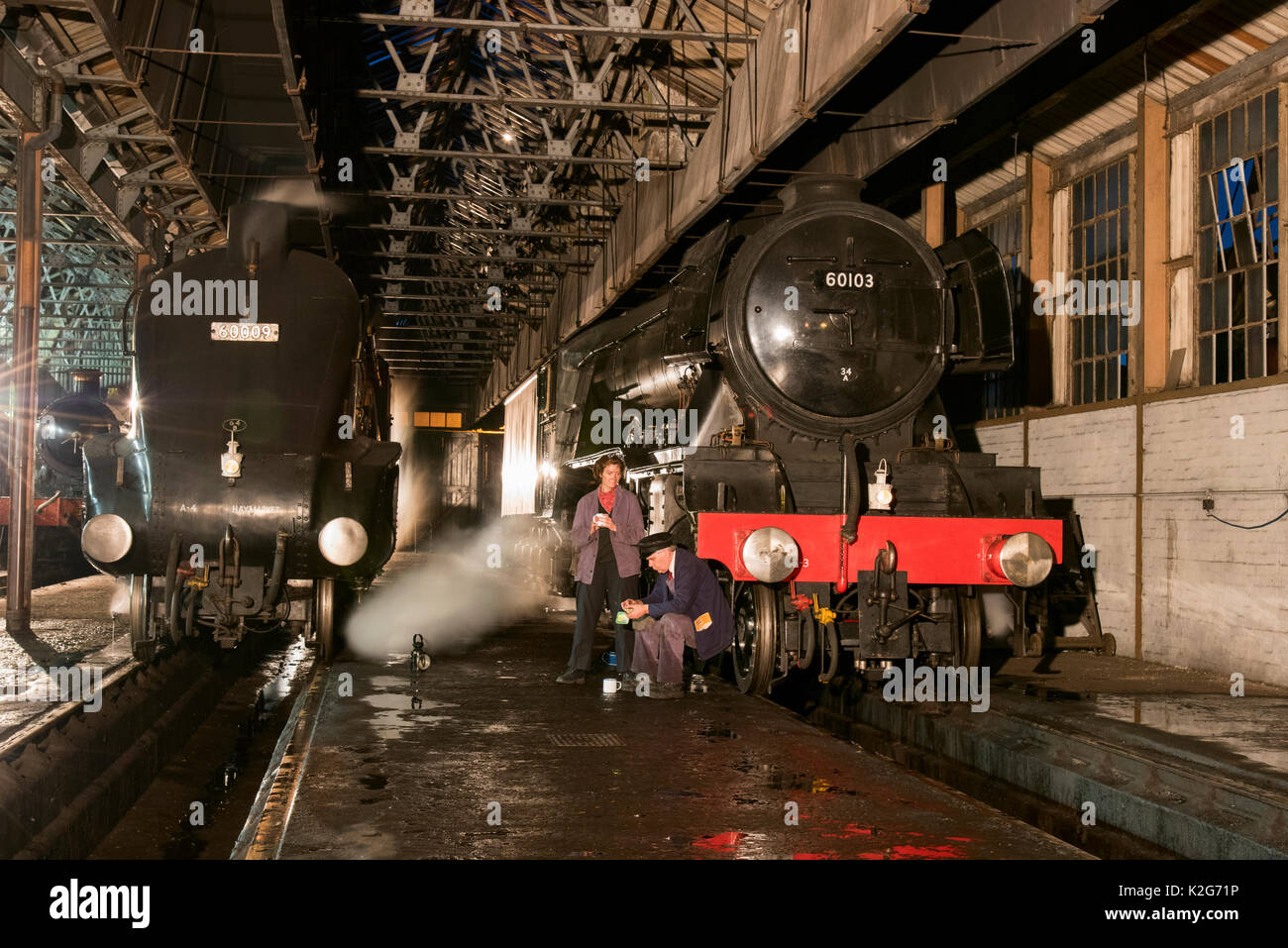 Flying Scotsman Steam Locomotive at night in the maintenance shed with ...