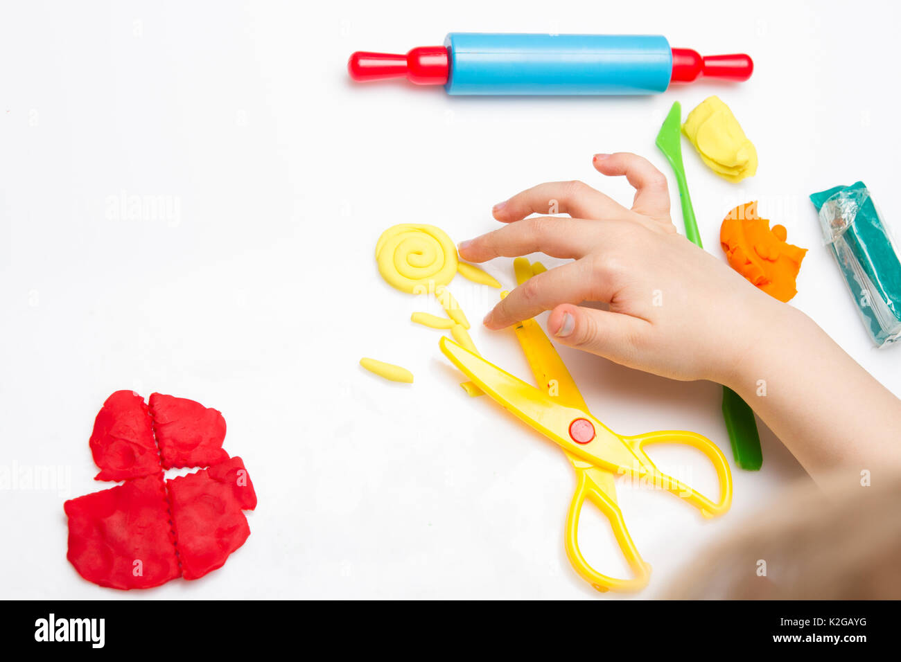 Child playing with playdough hi-res stock photography and images - Alamy