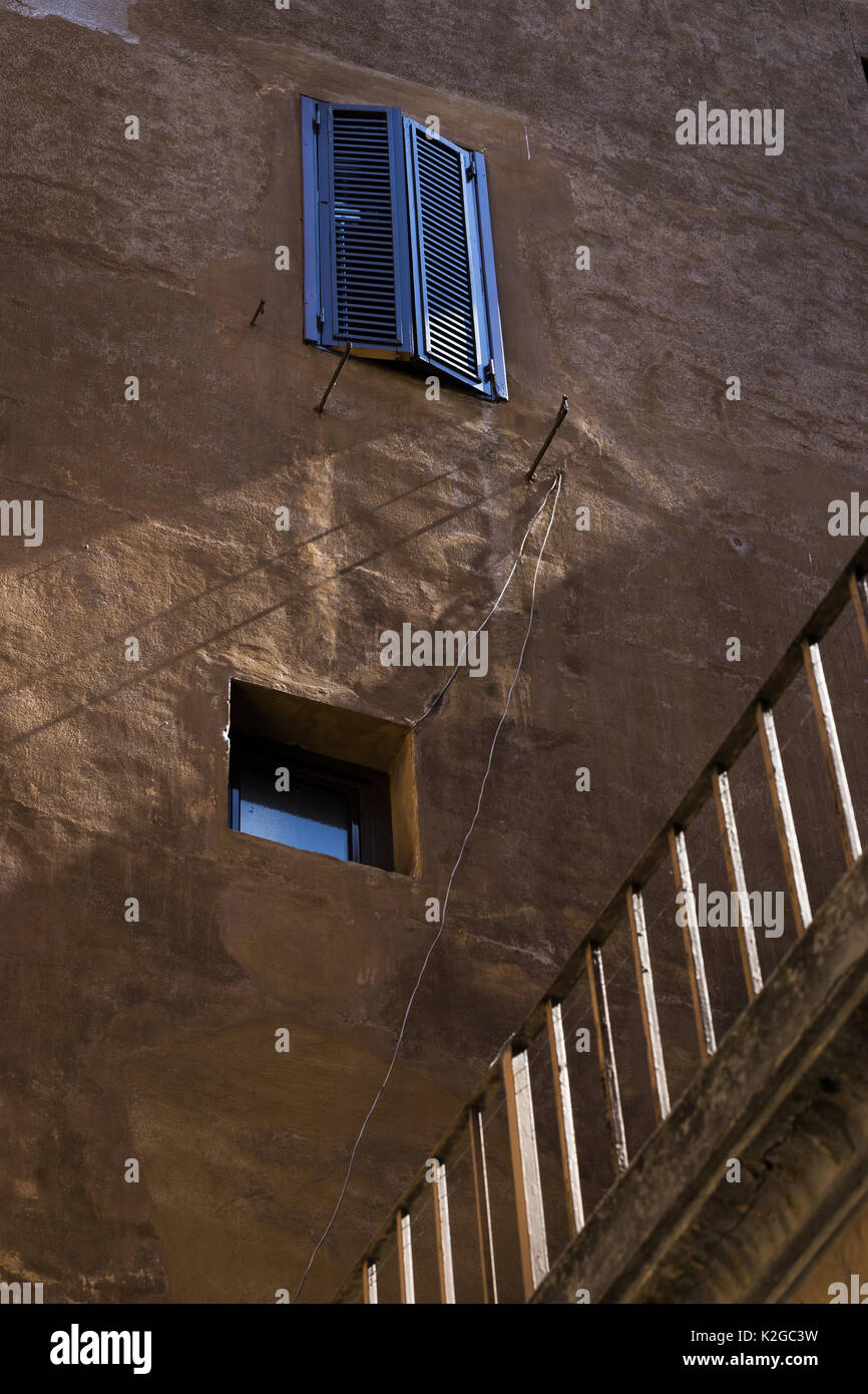 Old colorful facade walls and windows, grunge architectural background ...