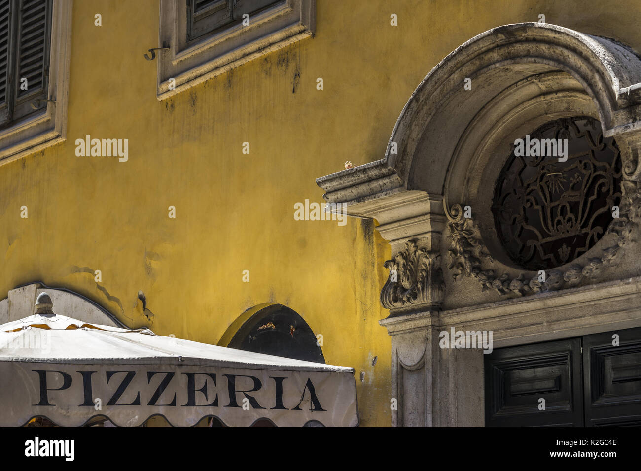 Old cozy street in Rome and typical Italian pizzeria. Architecture and ...