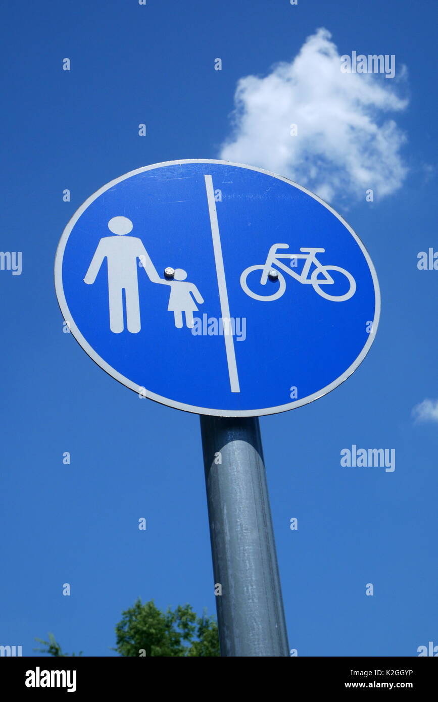 Road sign indicating pedestrian and cycle lanes, suburb of Wekerle ...