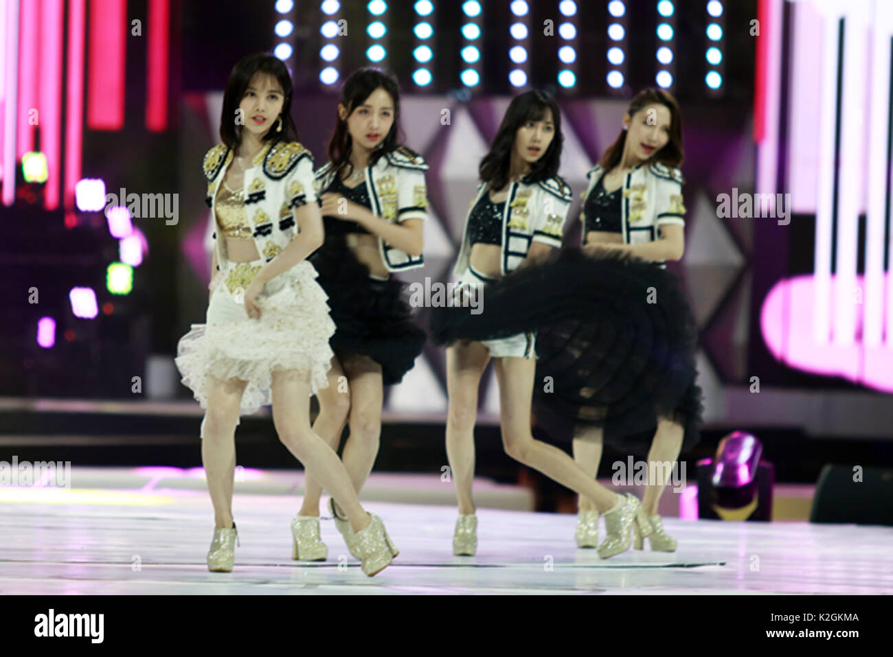 Members of Chinese girl group SNH48 perform during the final of the ...
