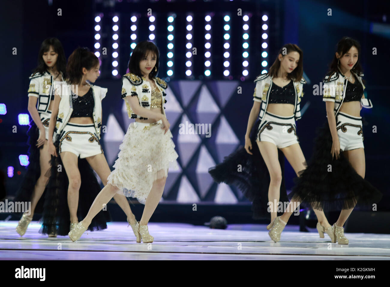 Members of Chinese girl group SNH48 perform during the final of the ...