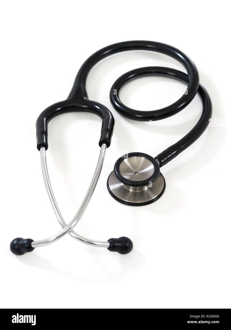 Photo of a stethoscope on white background with slight shadow visible ...