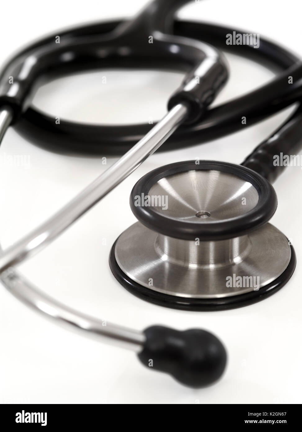 Macro cropped photo of a stethoscope on white background with slight ...