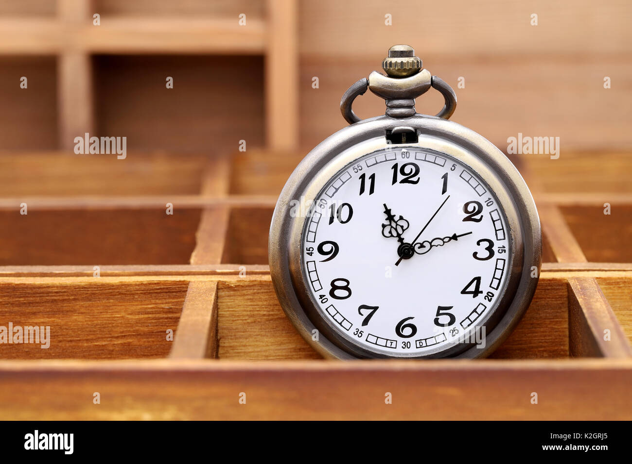 old pocket watch in old wooden container Stock Photo - Alamy