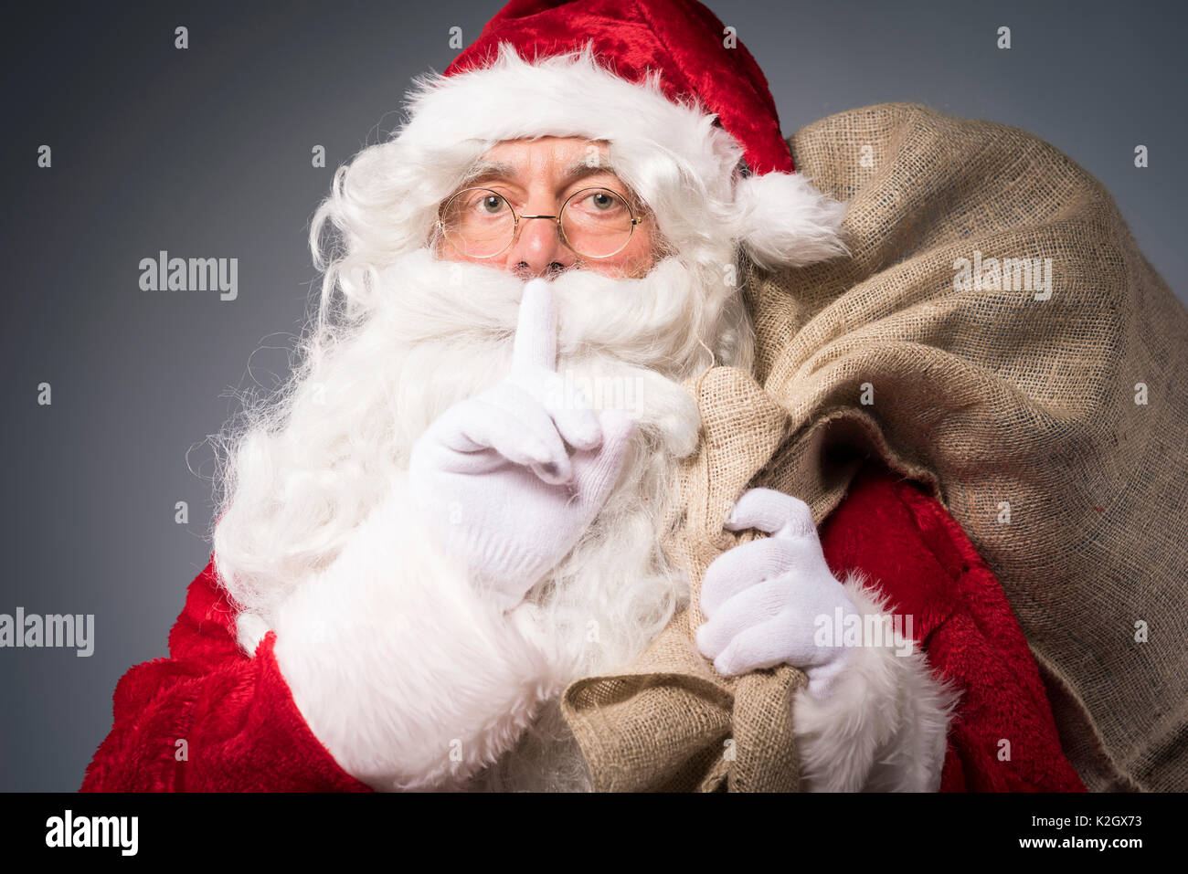 Sack full of presents is very heavy Stock Photo - Alamy
