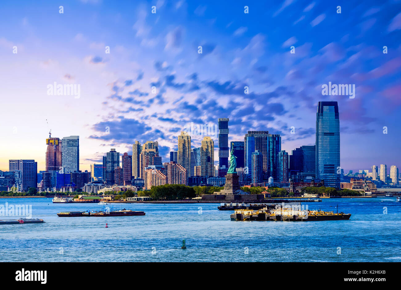 The Skyline Of Jersey City New Jersey From New York Harbor With The
