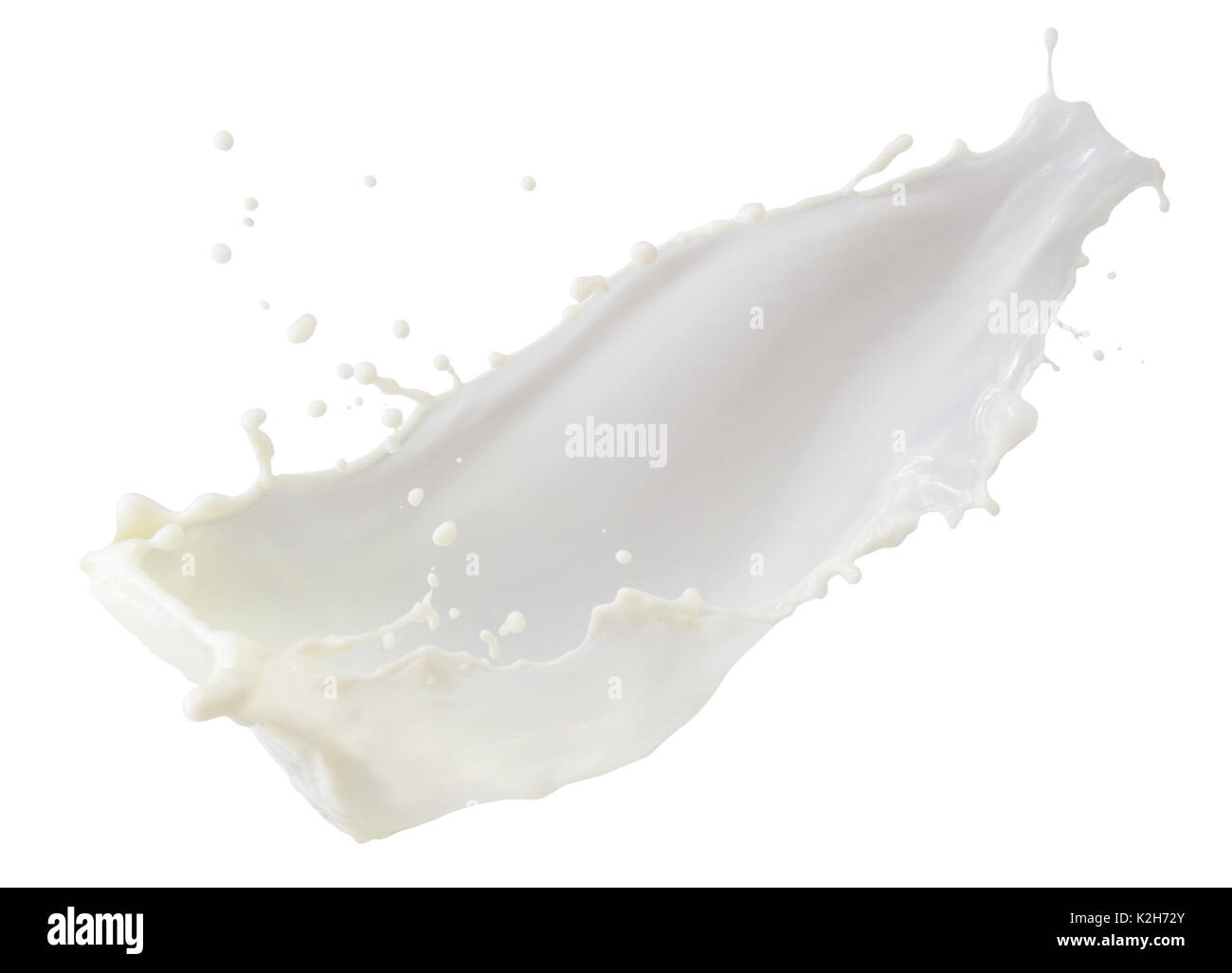 milk splash isolated on a white background Stock Photo - Alamy
