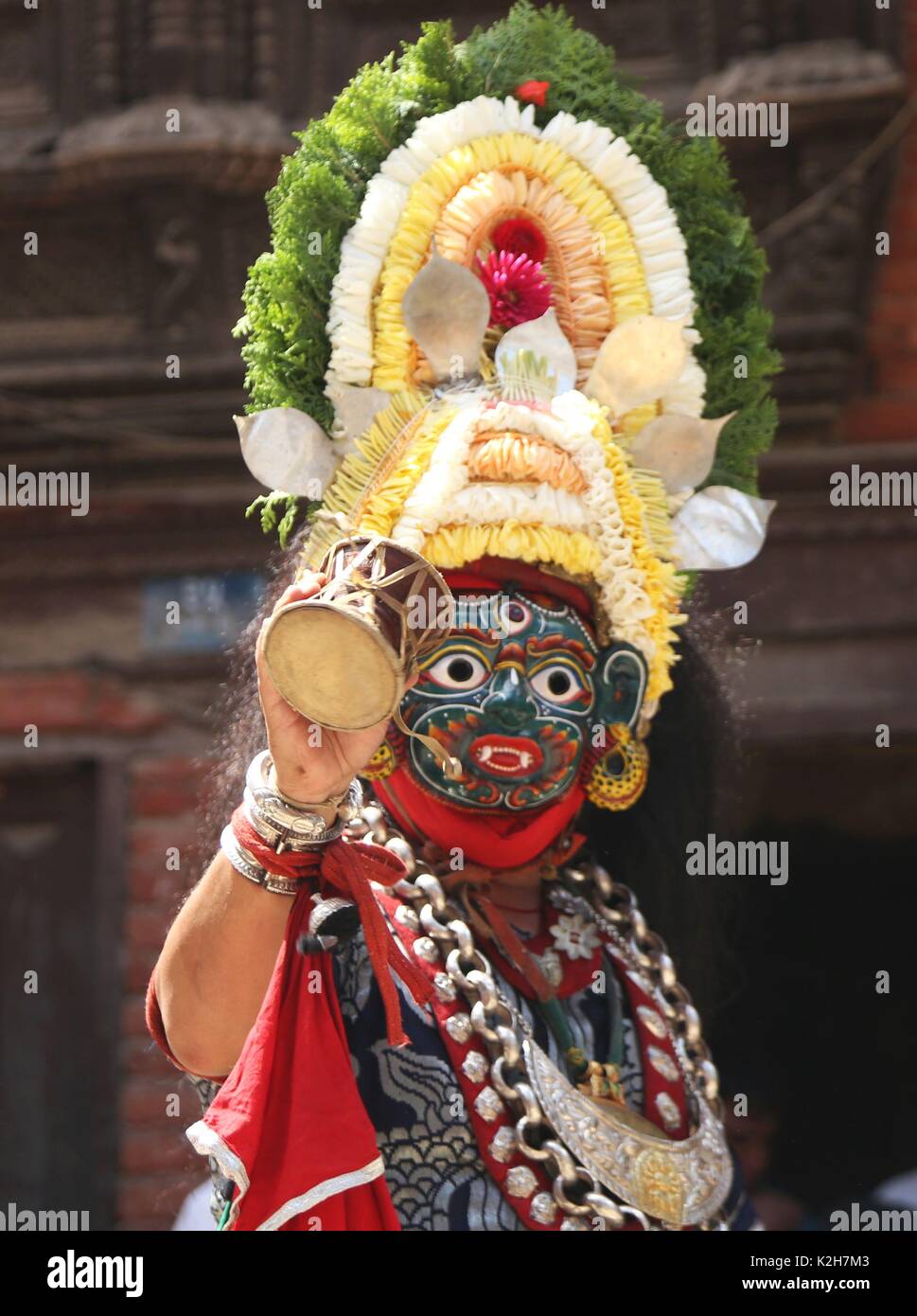 Kathmandu, Nepal. 30th Aug, 2017. A Nepalese masked dancer performs ...