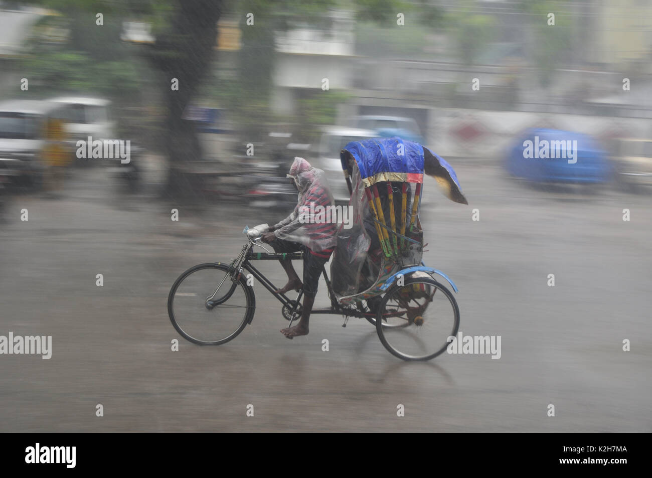 Agartala, India. 30th Aug, 2017. People are trying to take shelter in ...