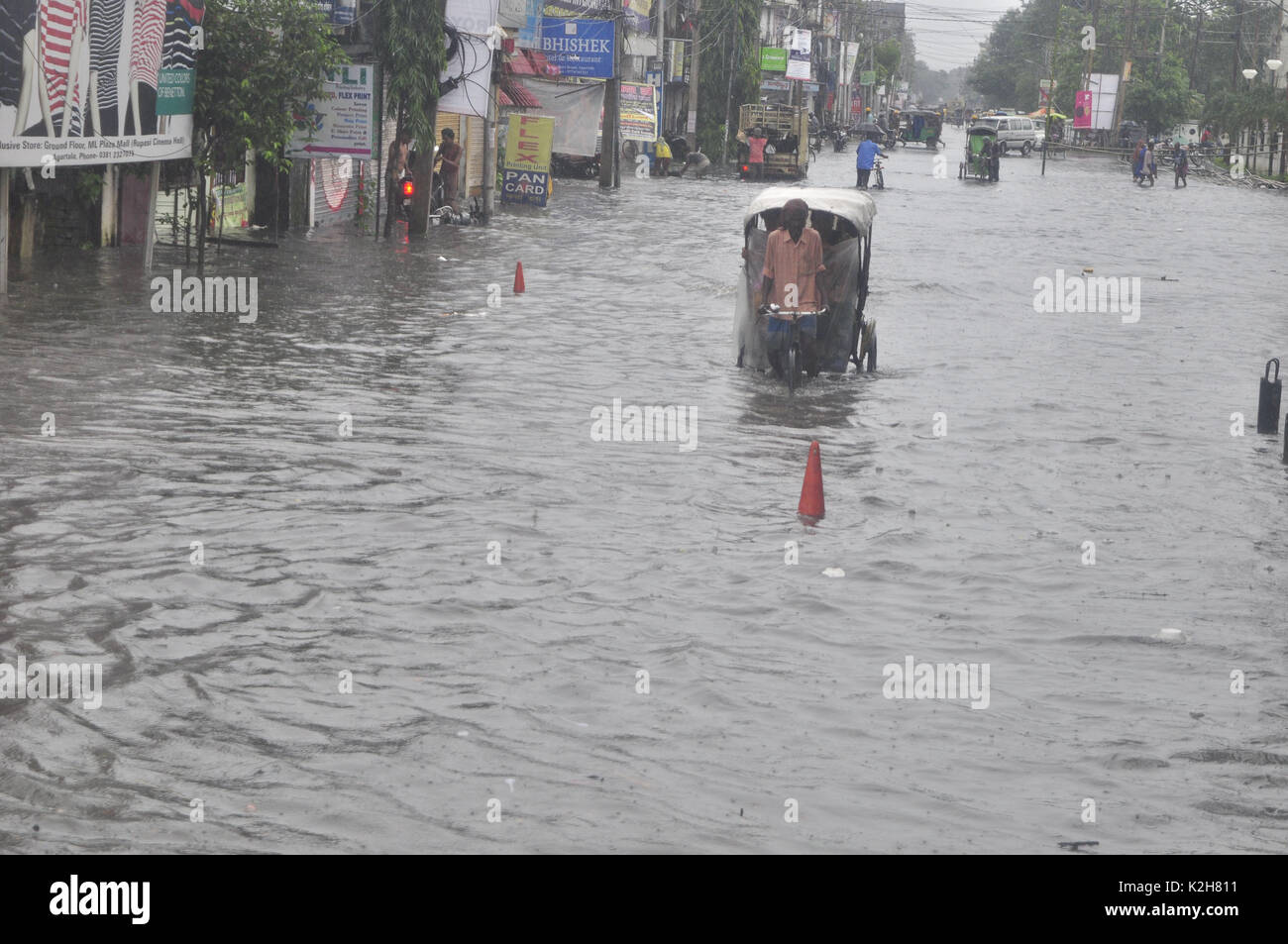 Agartala, India. 30th Aug, 2017. People are trying to take shelter in ...
