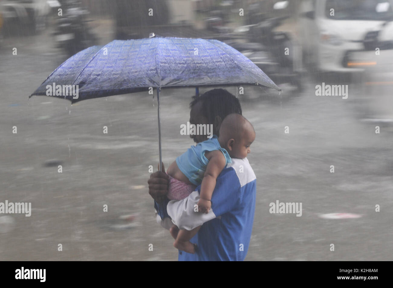 Agartala, India. 30th Aug, 2017. People are trying to take shelter in ...