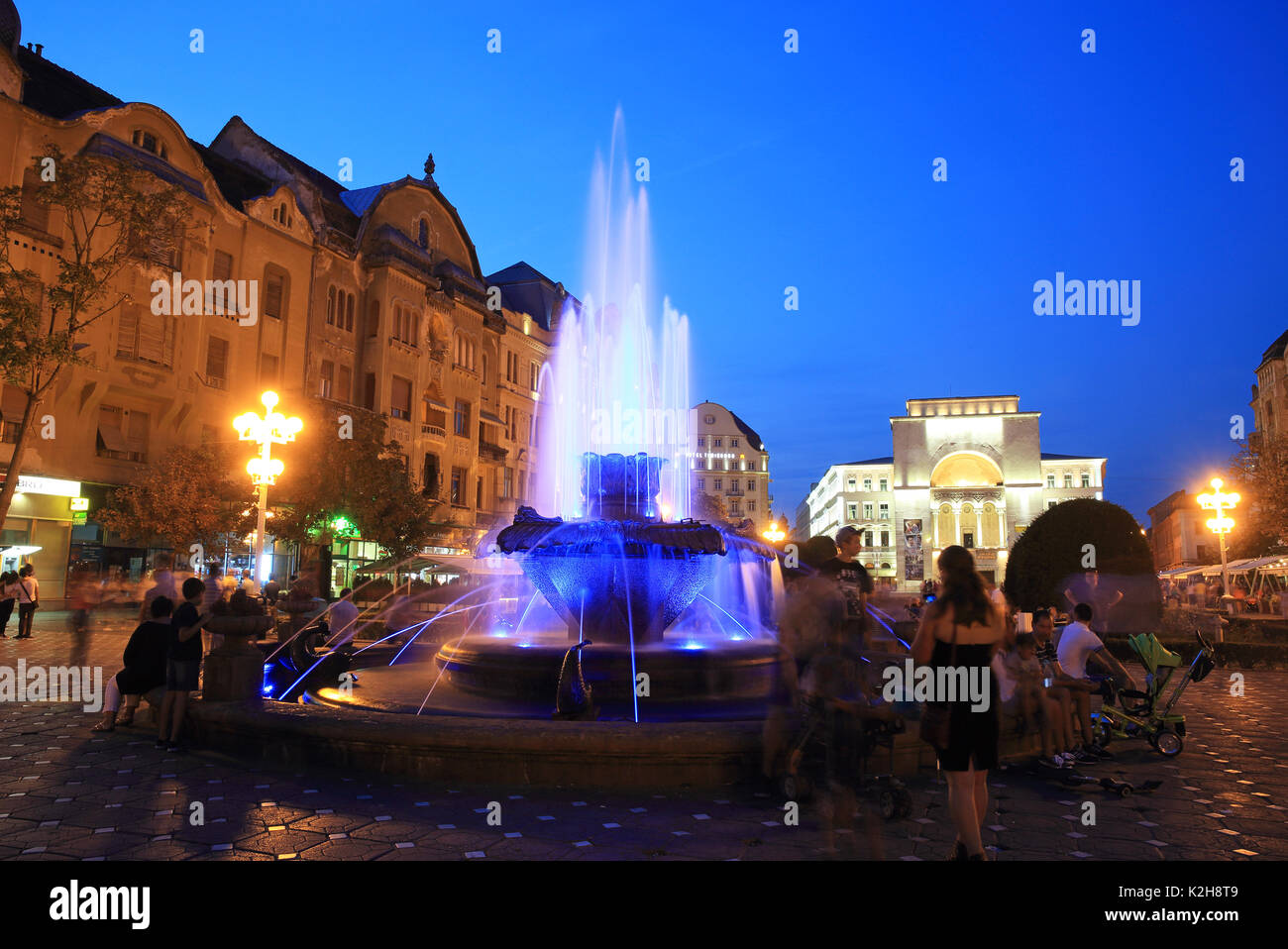 The coloured fountains on Victory Square, with the Opera House behind ...