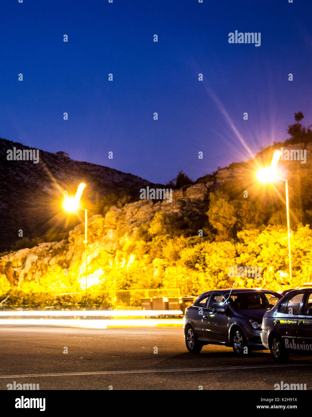Cars waiting in line at the port of Agia Marina, Marathonas, Greece to ...