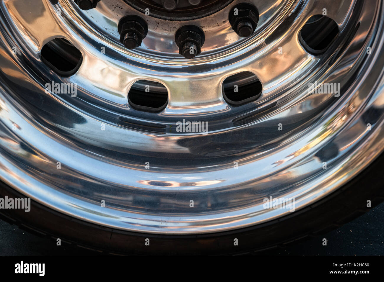 Closeup view of a chrome plated modern sports or hot-rod car double ...