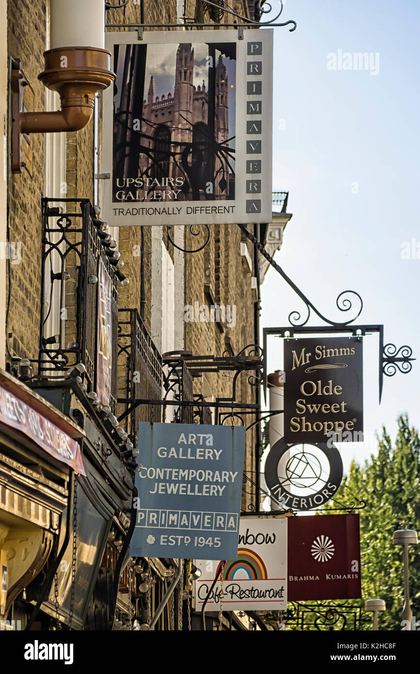 CAMBRIDGE, UK - AUGUST 11, 2017: Colourful signs in the City centre ...