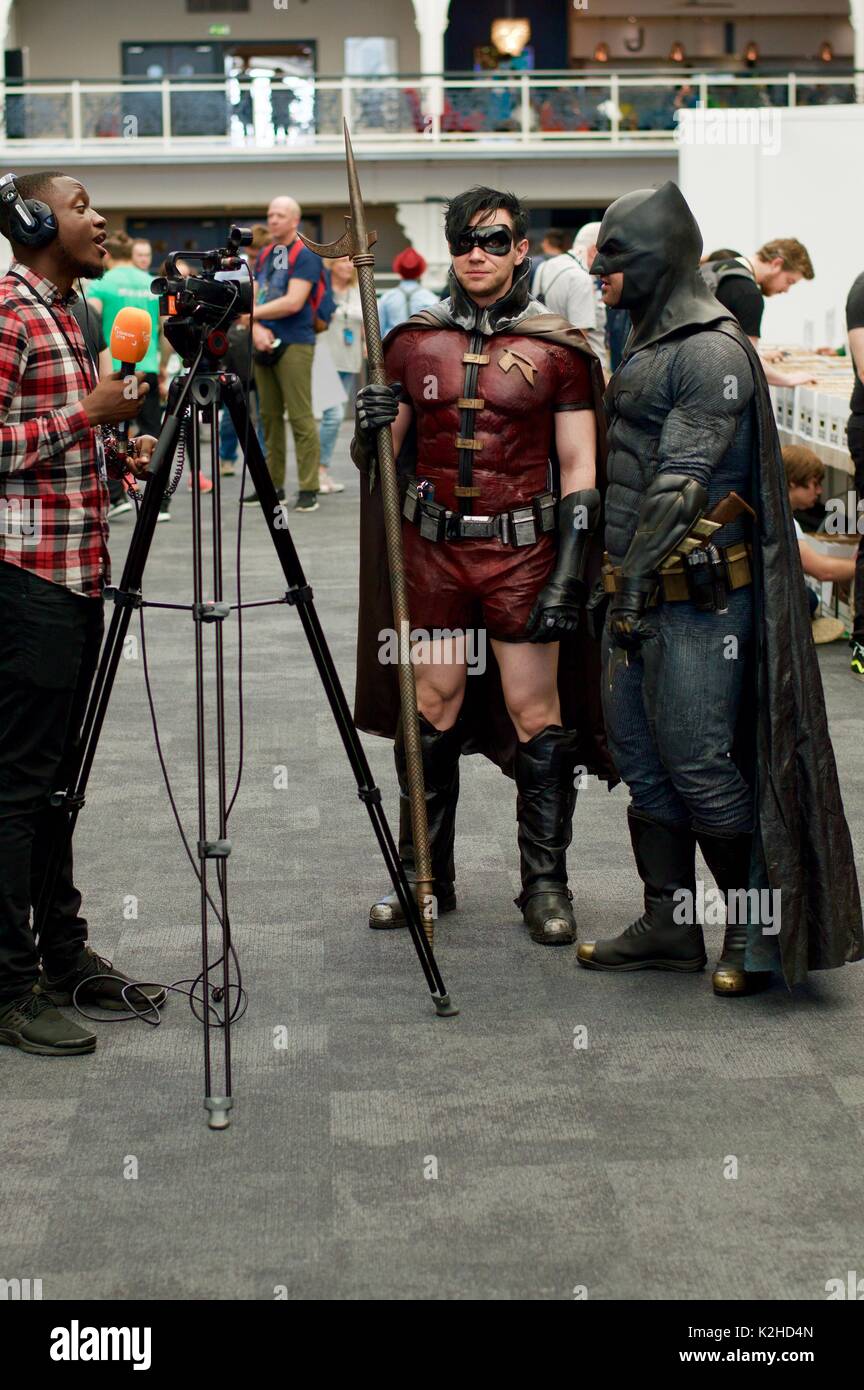Interviewing Batman and Robin Stock Photo - Alamy