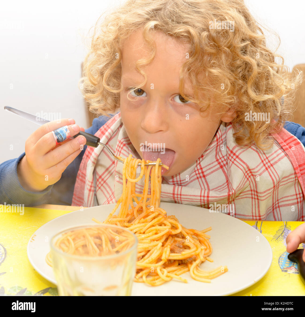 Kid Eating Pasta