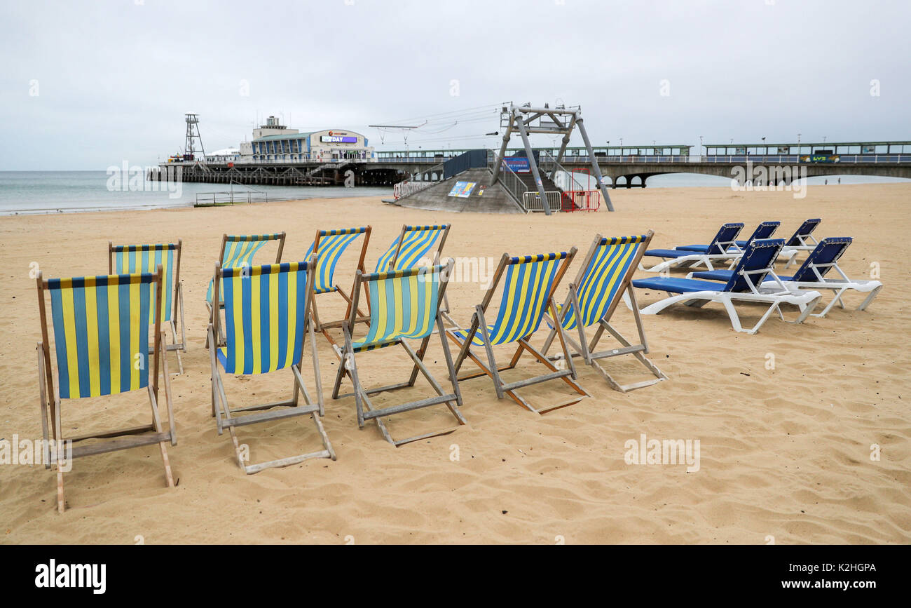 Empty deckchairs set up on Bournemouth beach in Dorset Stock Photo - Alamy