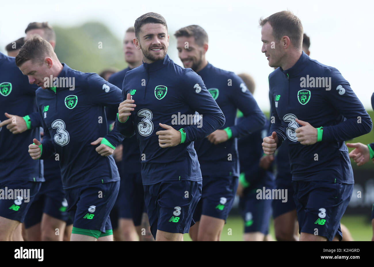 Ireland's Robbie Brady (centre) and Glenn Whelan (right) during a ...