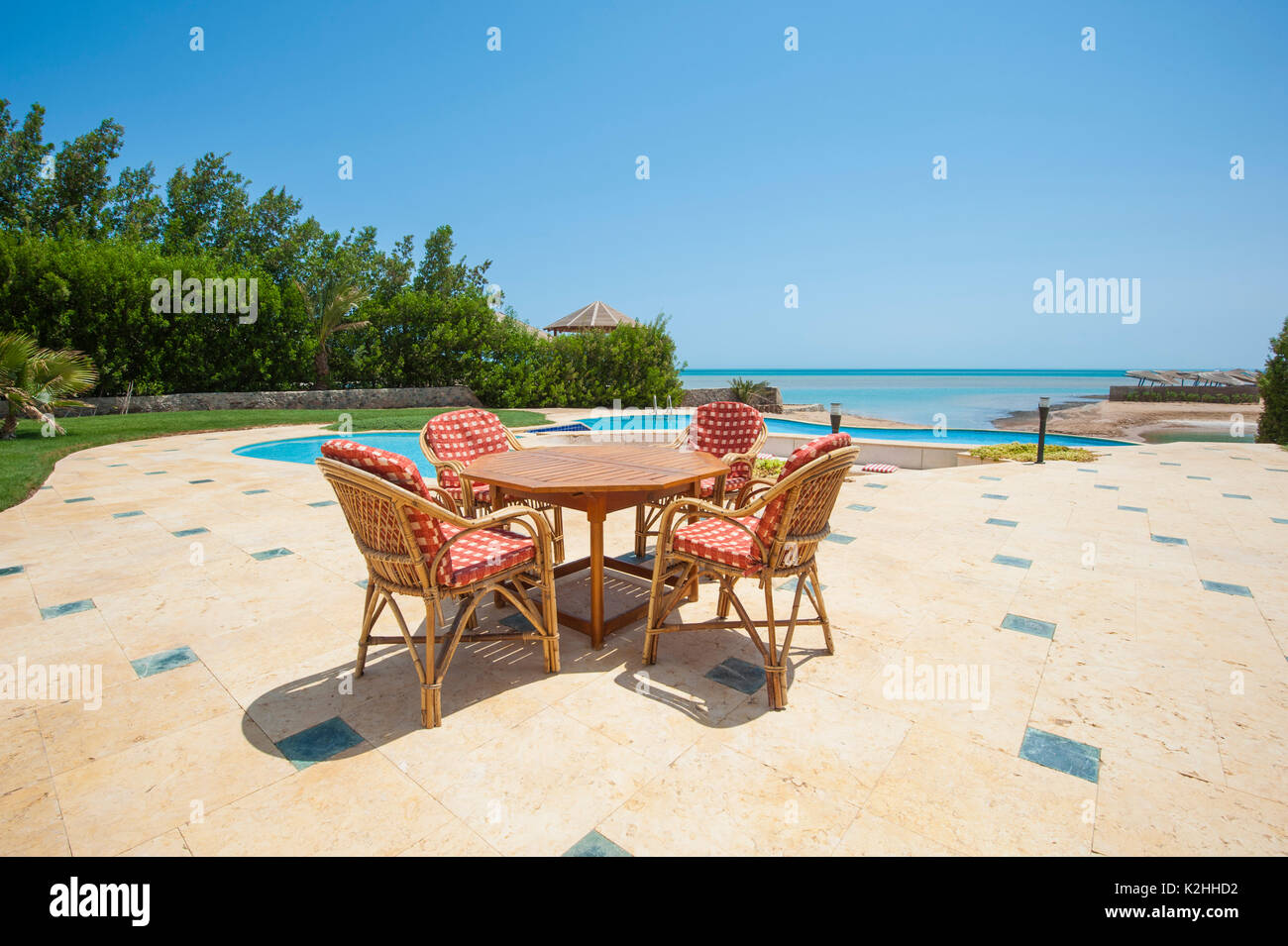 Luxury villa show home in tropical summer holiday resort with swimming ...