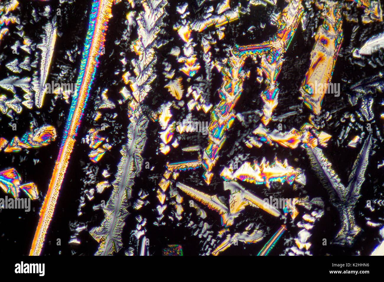 colorful microscopic shot of Sodium nitrate microcrystals in polarized ...