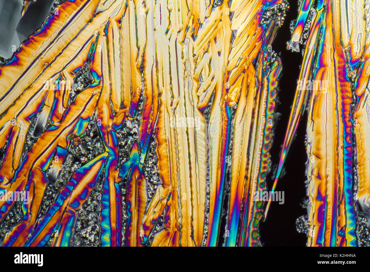 colorful microscopic shot of Sodium nitrate microcrystals in polarized ...