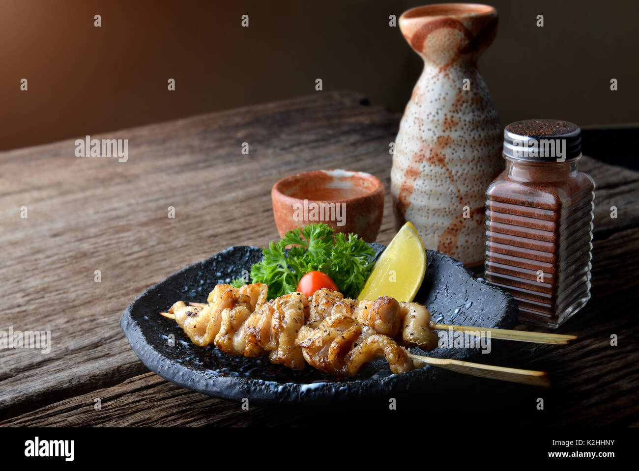 Chicken skin grilled with charcoal fire in Japanese style call torikawa ...