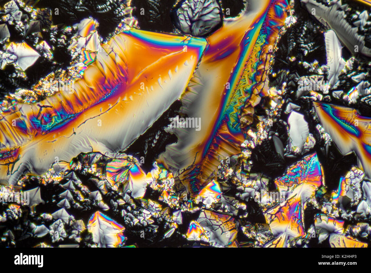 colorful microscopic shot of Sodium nitrate microcrystals in polarized ...