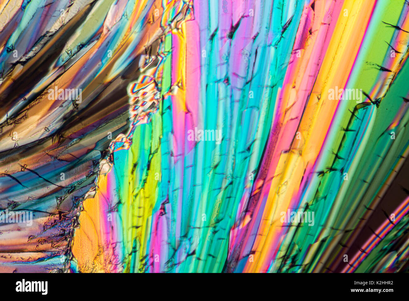 colorful microscopic shot of sugar micro crystals in polarized light ...