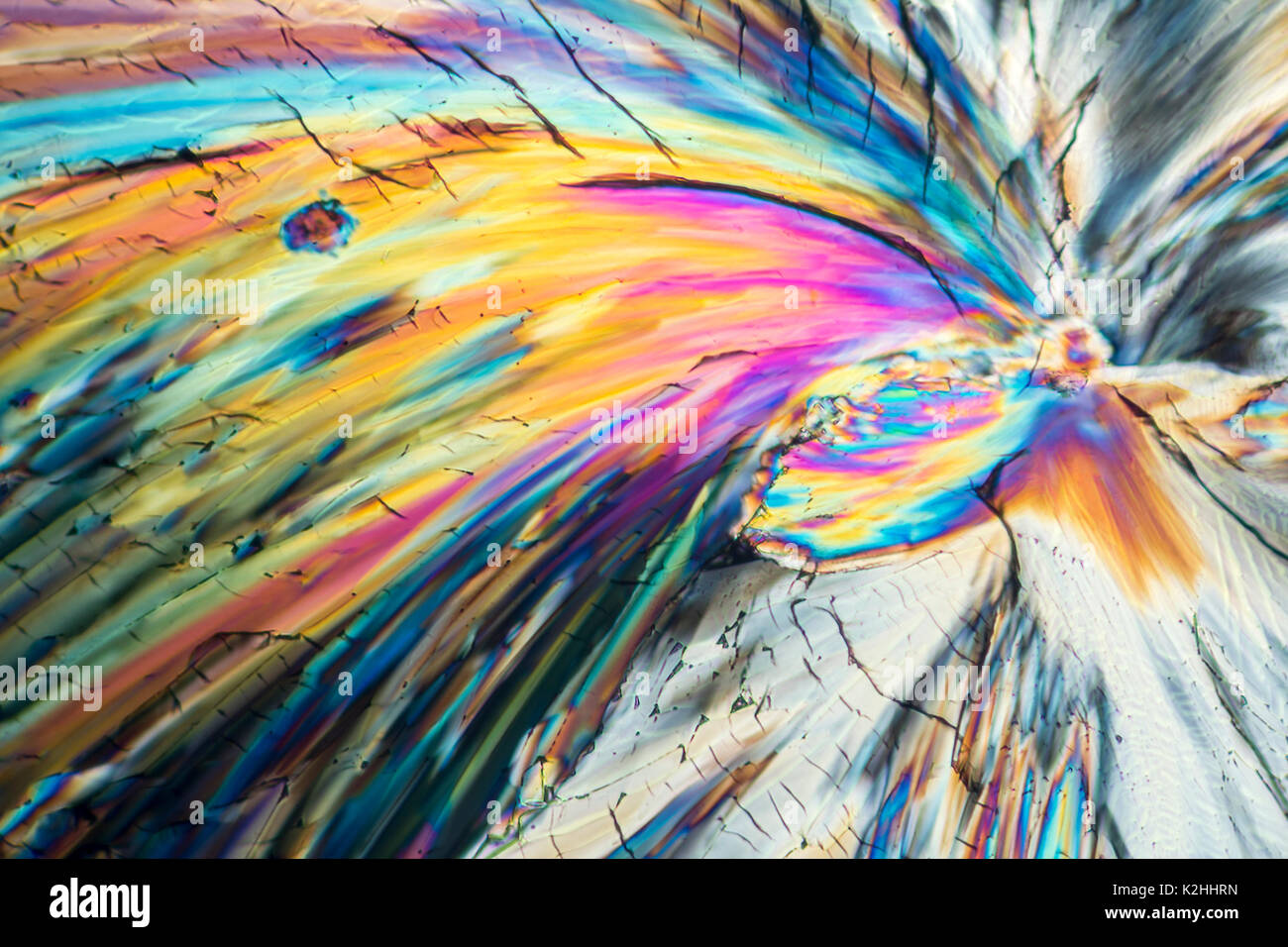colorful microscopic shot of sugar micro crystals in polarized light ...